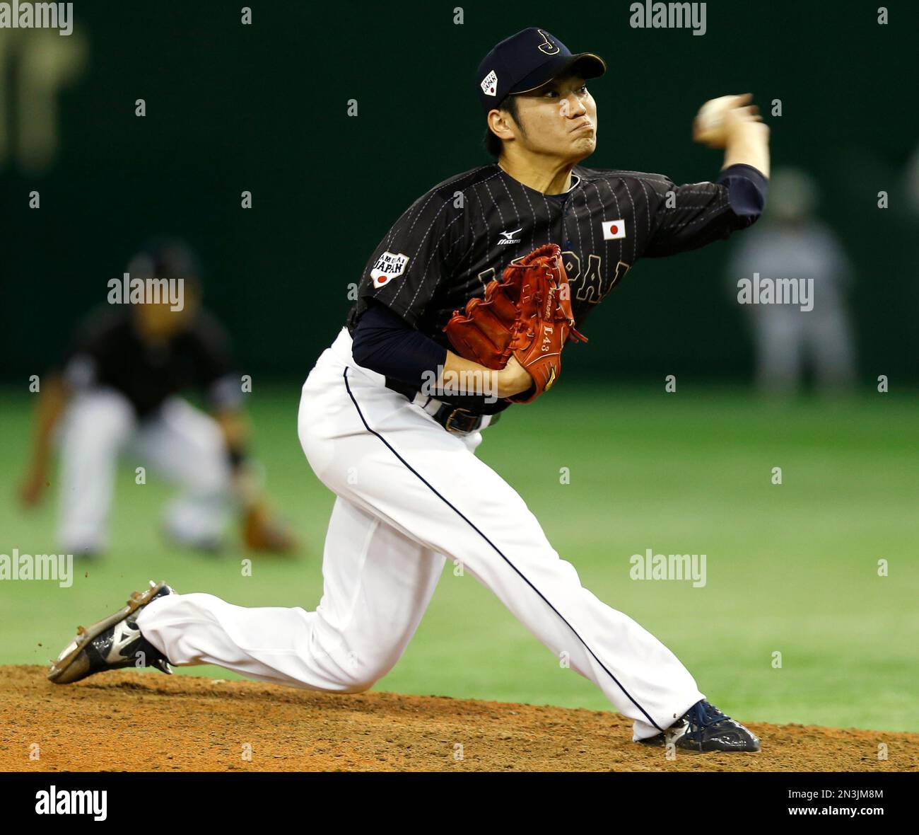 Japan's closer Tomomi Takahashi pitches against Major League All-Stars ...
