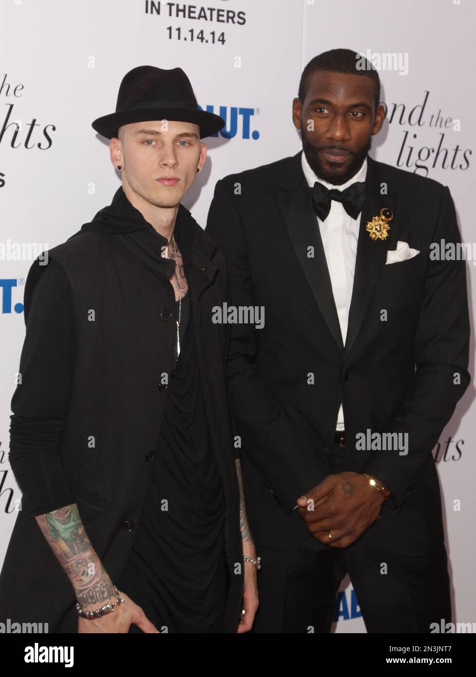 Rapper Colson "MGK" Baker and N.Y. Knicks player and producer Amar'e ...