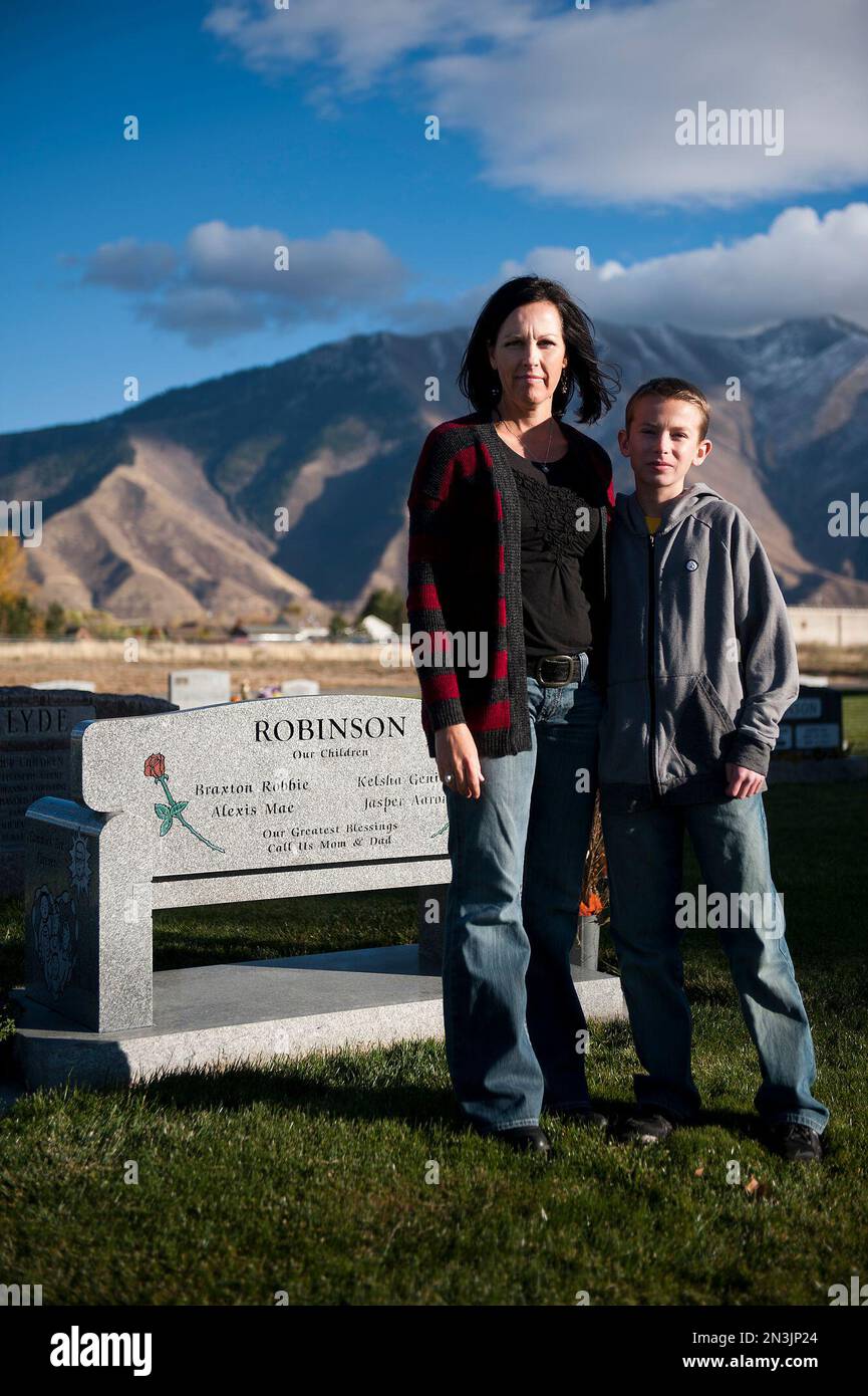 Lorraine Mason and her son Jasper Robinson pose for a portrait next to ...