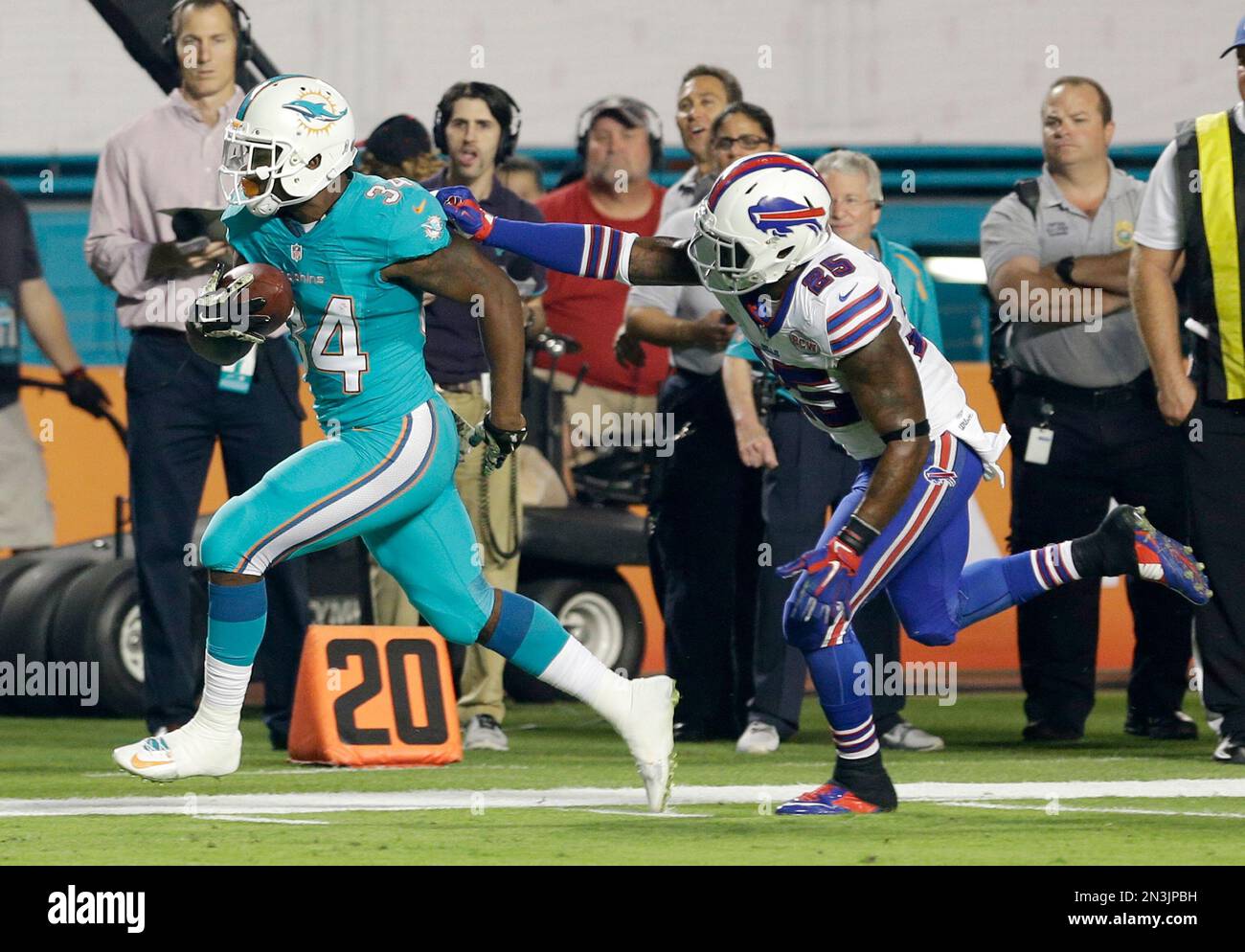 Miami Dolphins running back Damien Williams (34) runs for yardage as ...