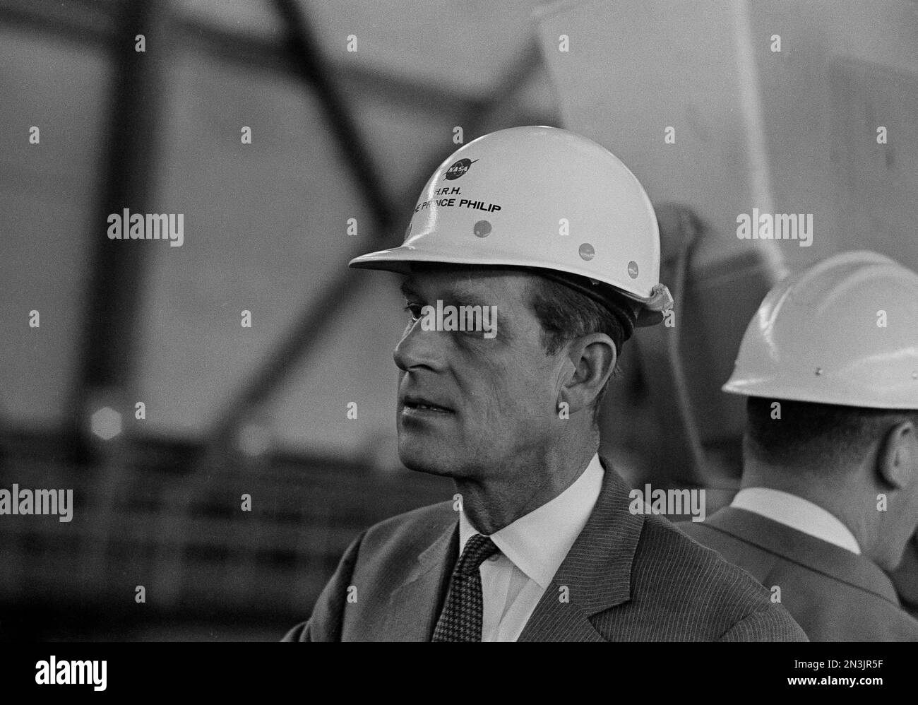 Prince Philip of Great Britain wears a hard hat, a must around rocket ...