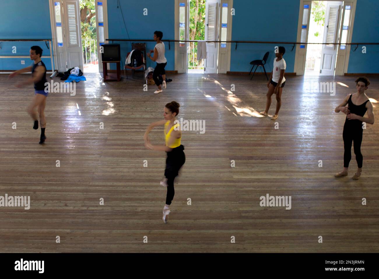 In this Oct. 30, 2014 photo, dancers train at the National Cuban Ballet ...