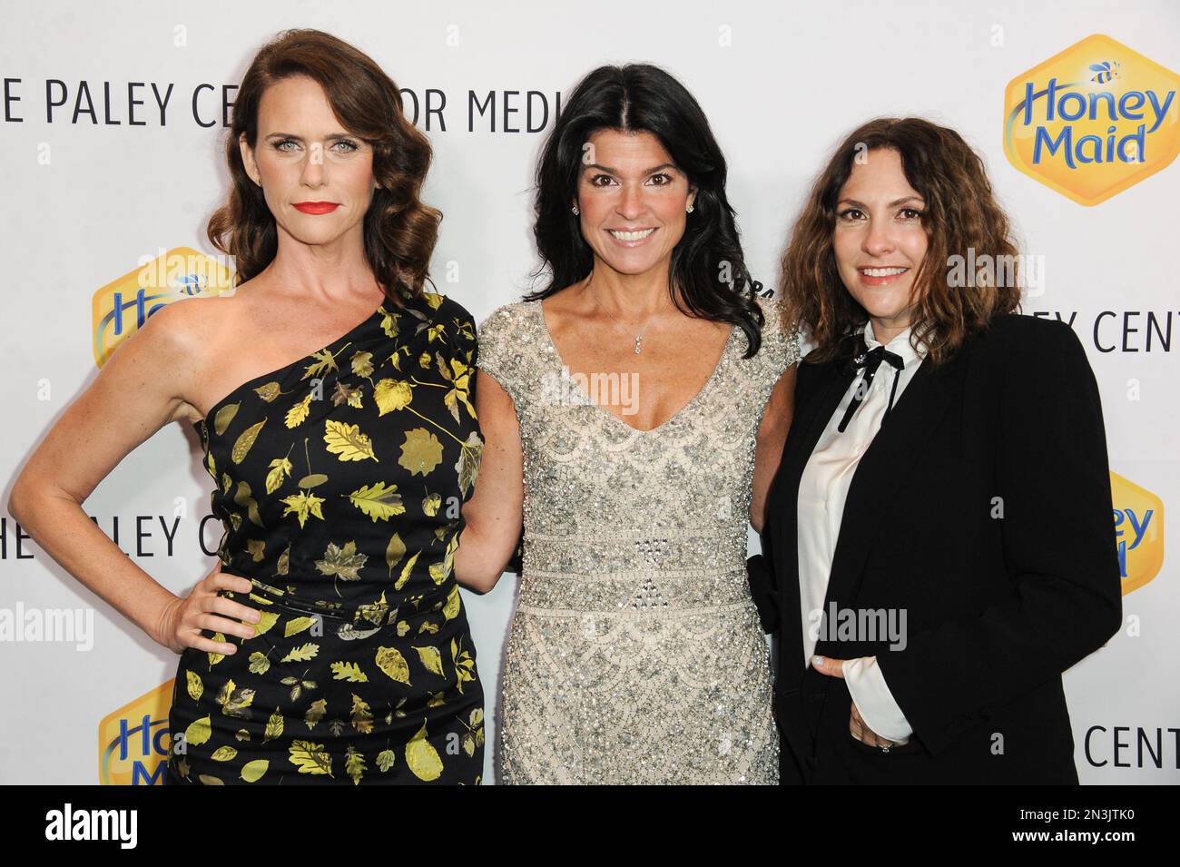 From left, Amy Landecker, Maureen J. Reidy, and Jill Soloway arrive at ...
