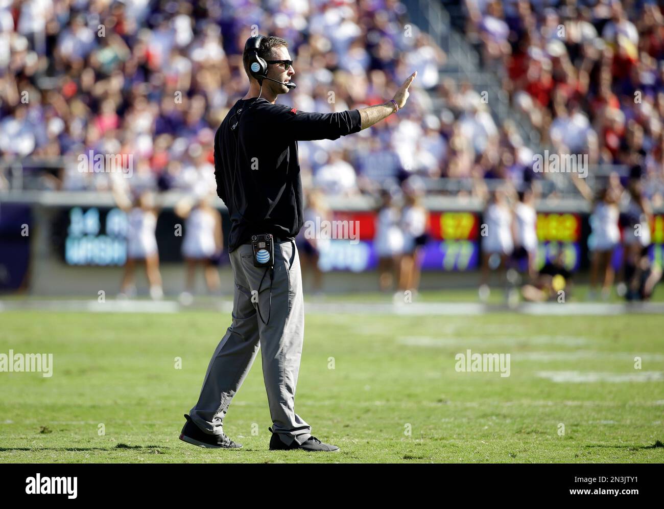 Texas Tech head coach Kliff Kingsbury instructs his team during an NCAA ...