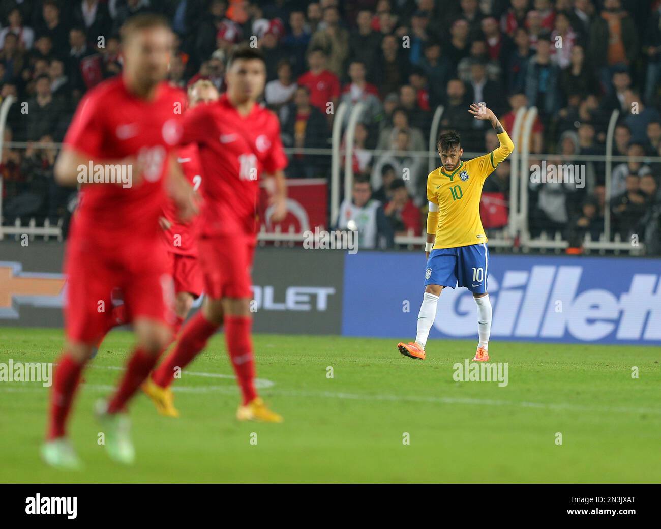 Brazil's Neymar JR reacts to cheering soccer fans after their friendly ...