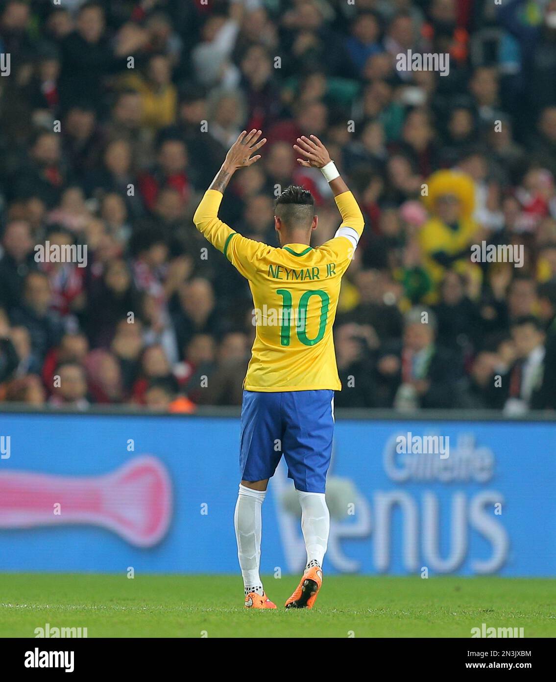 Brazil's Neymar JR reacts to cheering soccer fans after their friendly ...