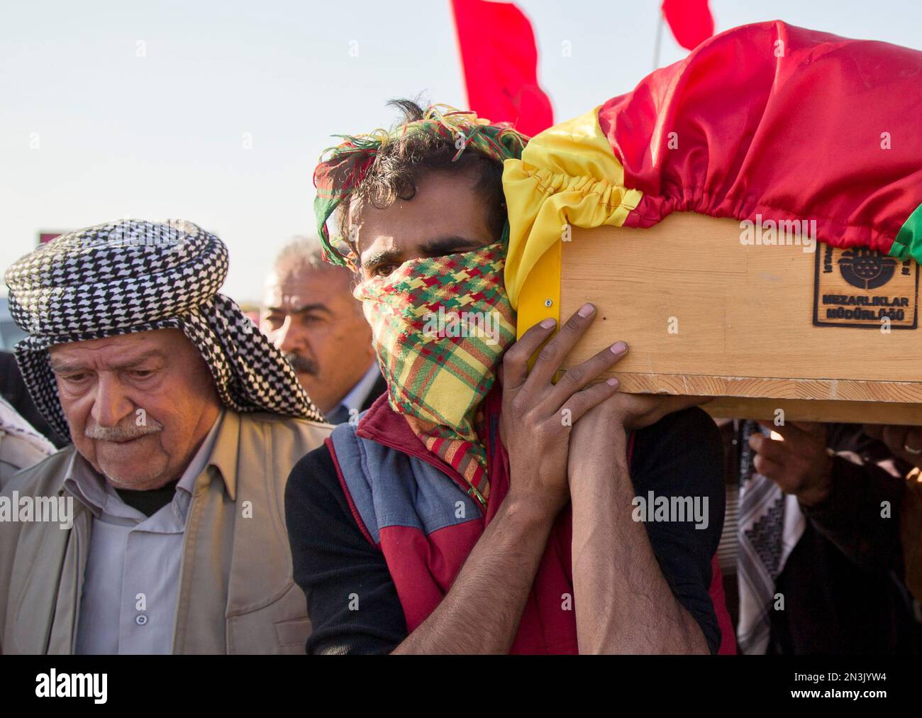 Kurdish men carry the coffin of YPG, or People's Protection Units ...
