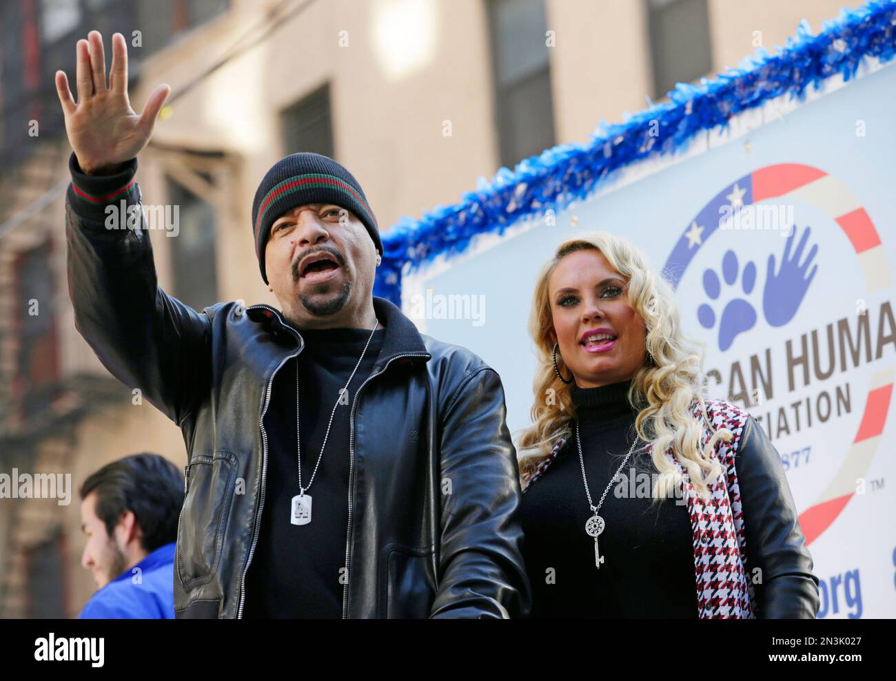 Rapper Ice-T waves at spectators with his wife Coco by his side as they ...