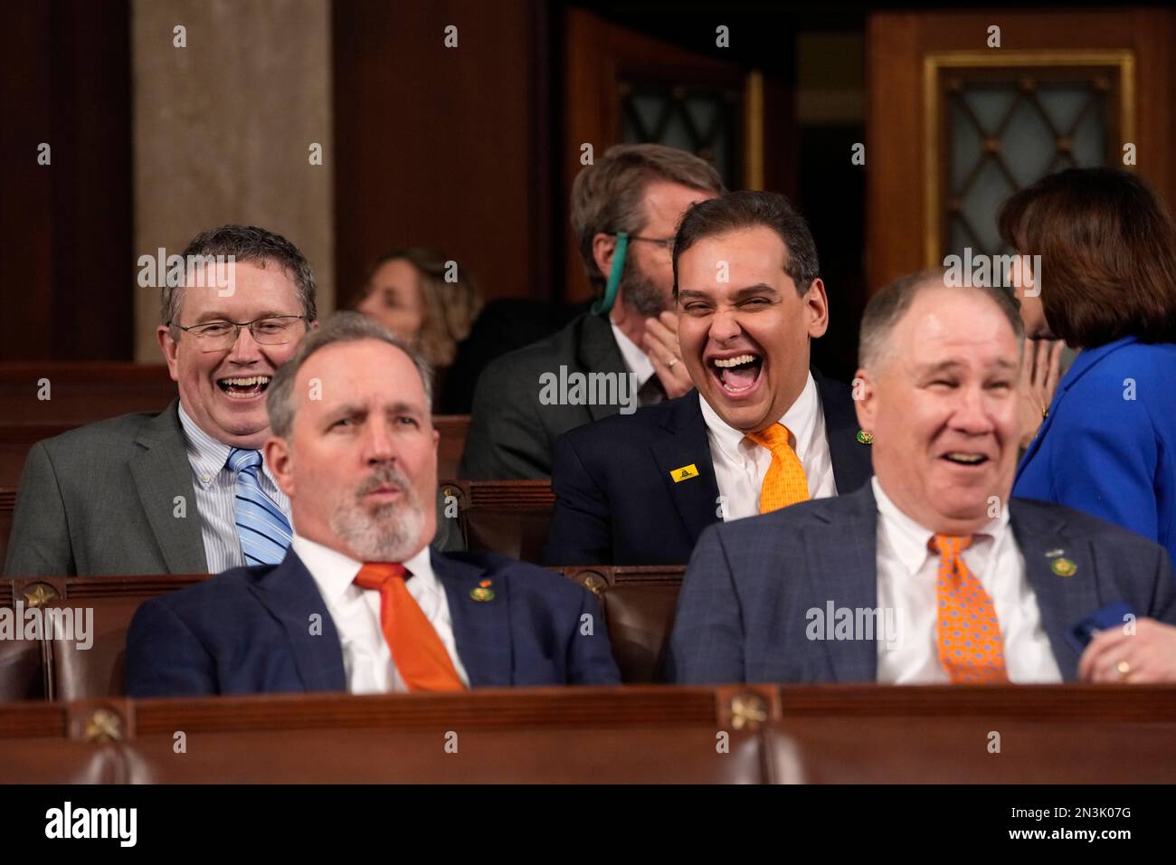 Rep. Thomas Massie, R-Ky., back left, and Rep. George Santos, R-N.Y ...