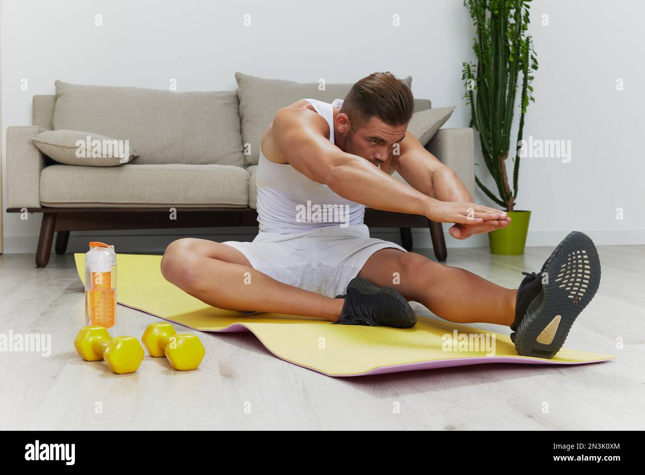 Man sport does muscle and body stretching, pumped up man fitness ...