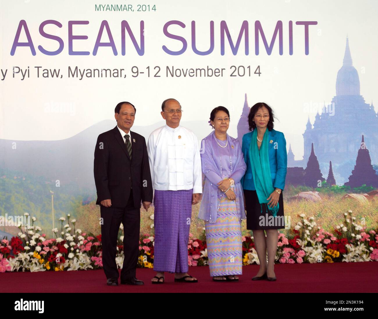Myanmar President Thein Sein, second from left, and his wife Khin Khin ...