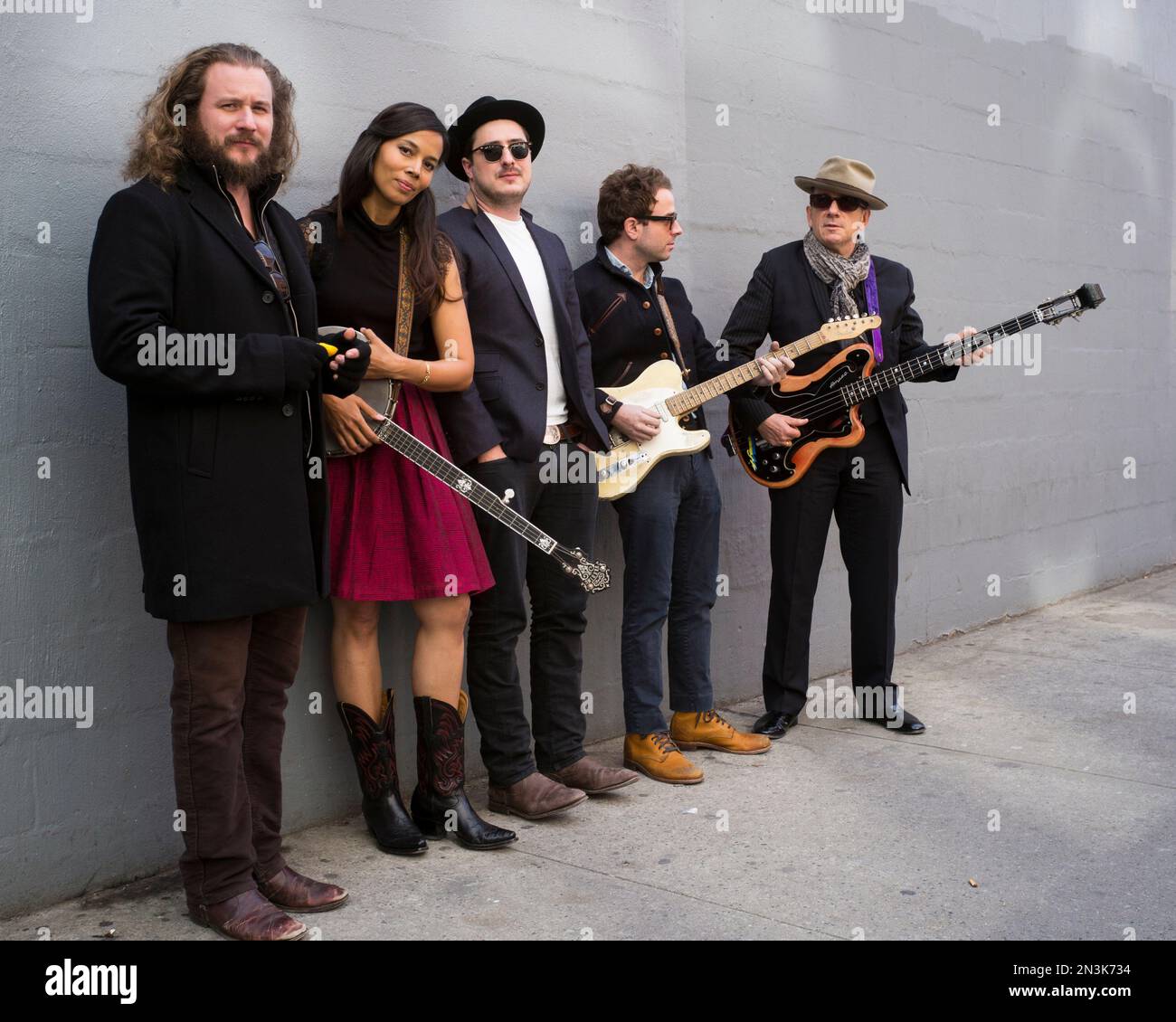 This Nov. 9, 2014 photo shows, from left, Jim James, Rhiannon Giddens ...