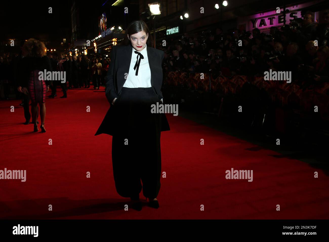 Lorde poses for photographers upon arrival to the world premiere of the ...