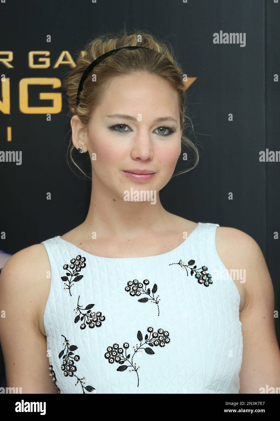 Jennifer Lawrence poses for photographers upon arrival to the world ...