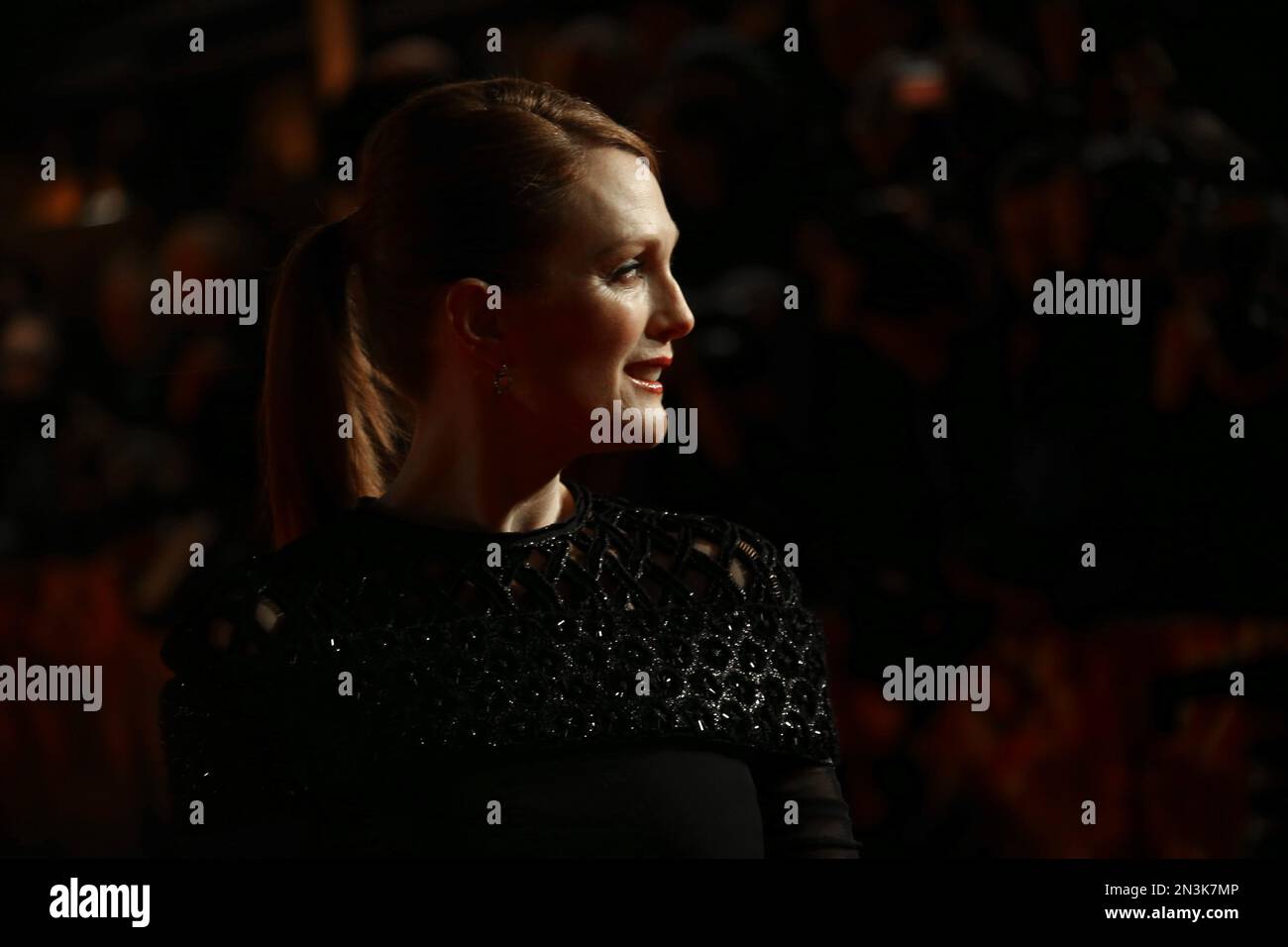 Actress Julianne Moore poses for photographers upon arrival to the ...