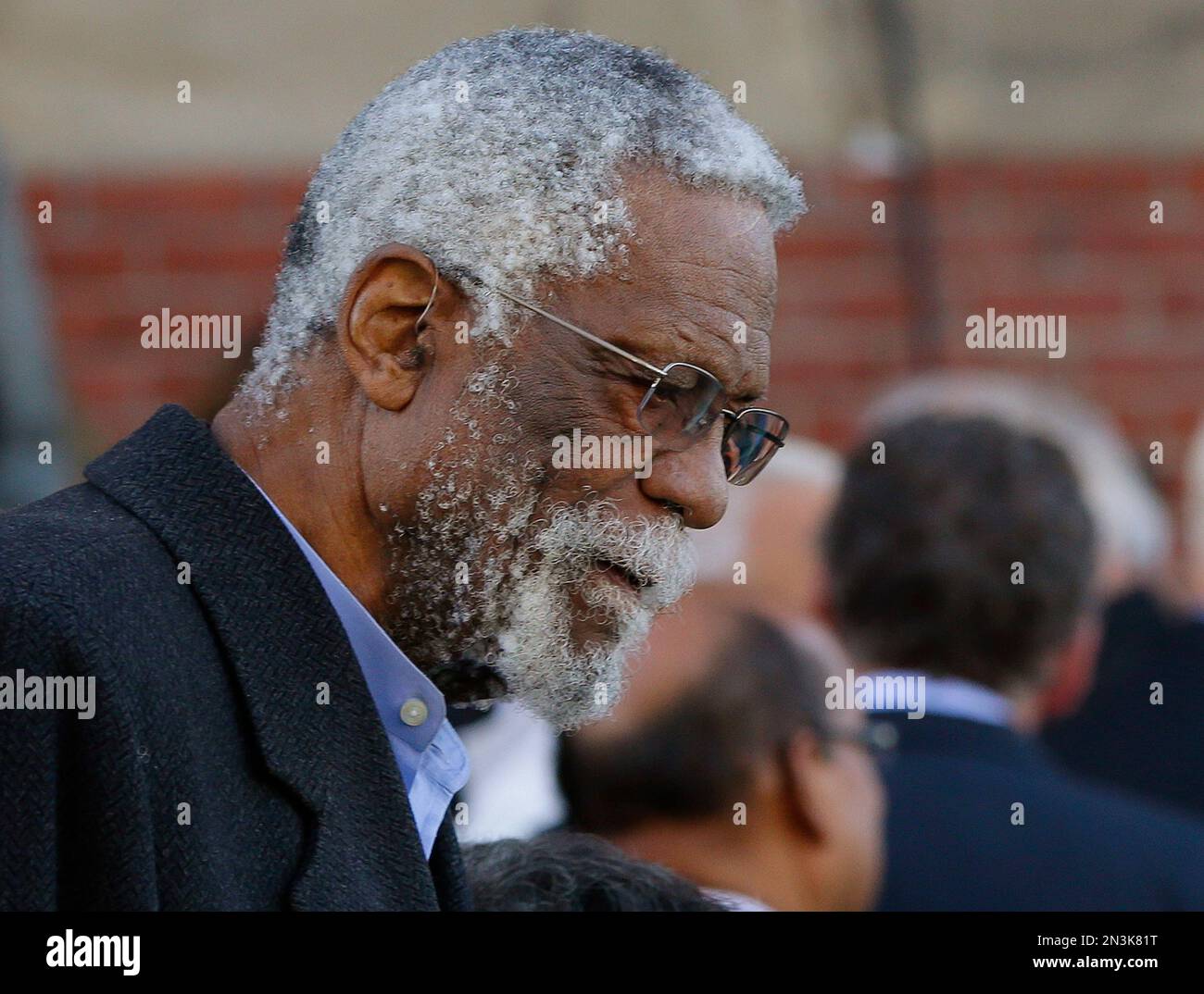 Former Boston Celtic great Bill Russell leaves the church after the ...