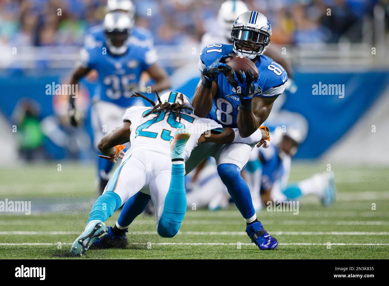 Detroit Lions wide receiver Calvin Johnson (81) makes a reception ...