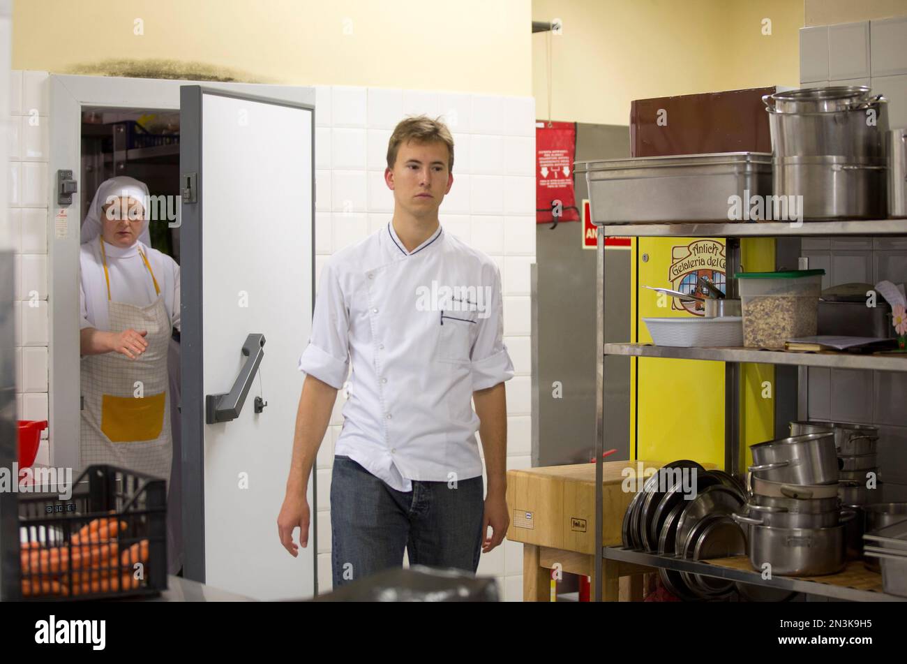 Swiss Guard David Geisser,right, arrives in the kitchen at the Swiss ...