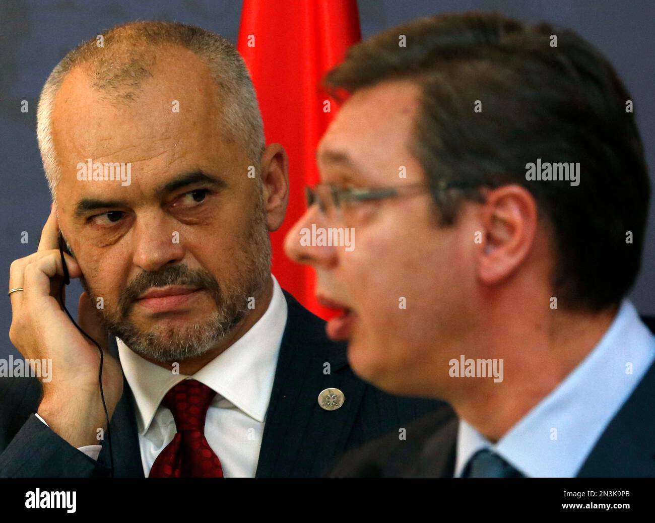 Albanian Prime Minister Edi Rama, left, listens his Serbian counterpart ...