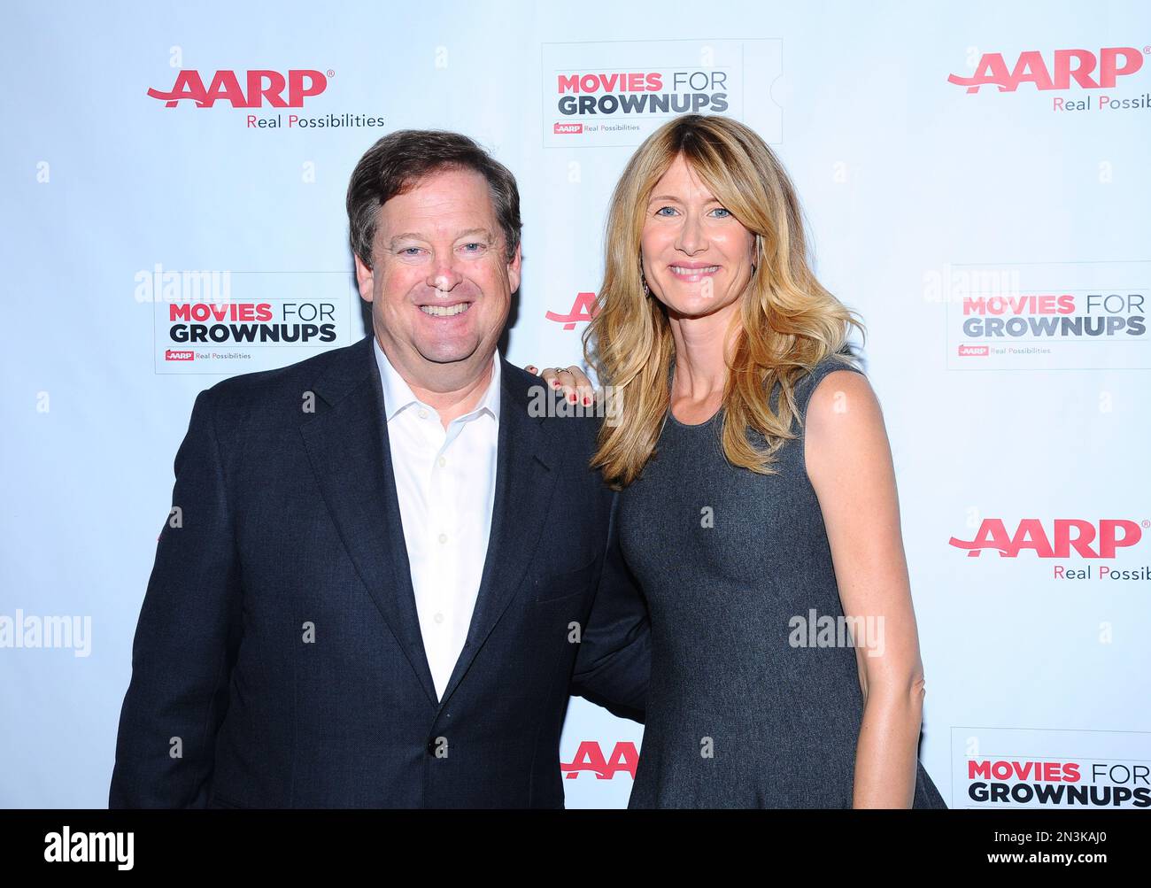 Journalist Sam Rubin, left, and Laura Dern arrive at the AARP Movies ...