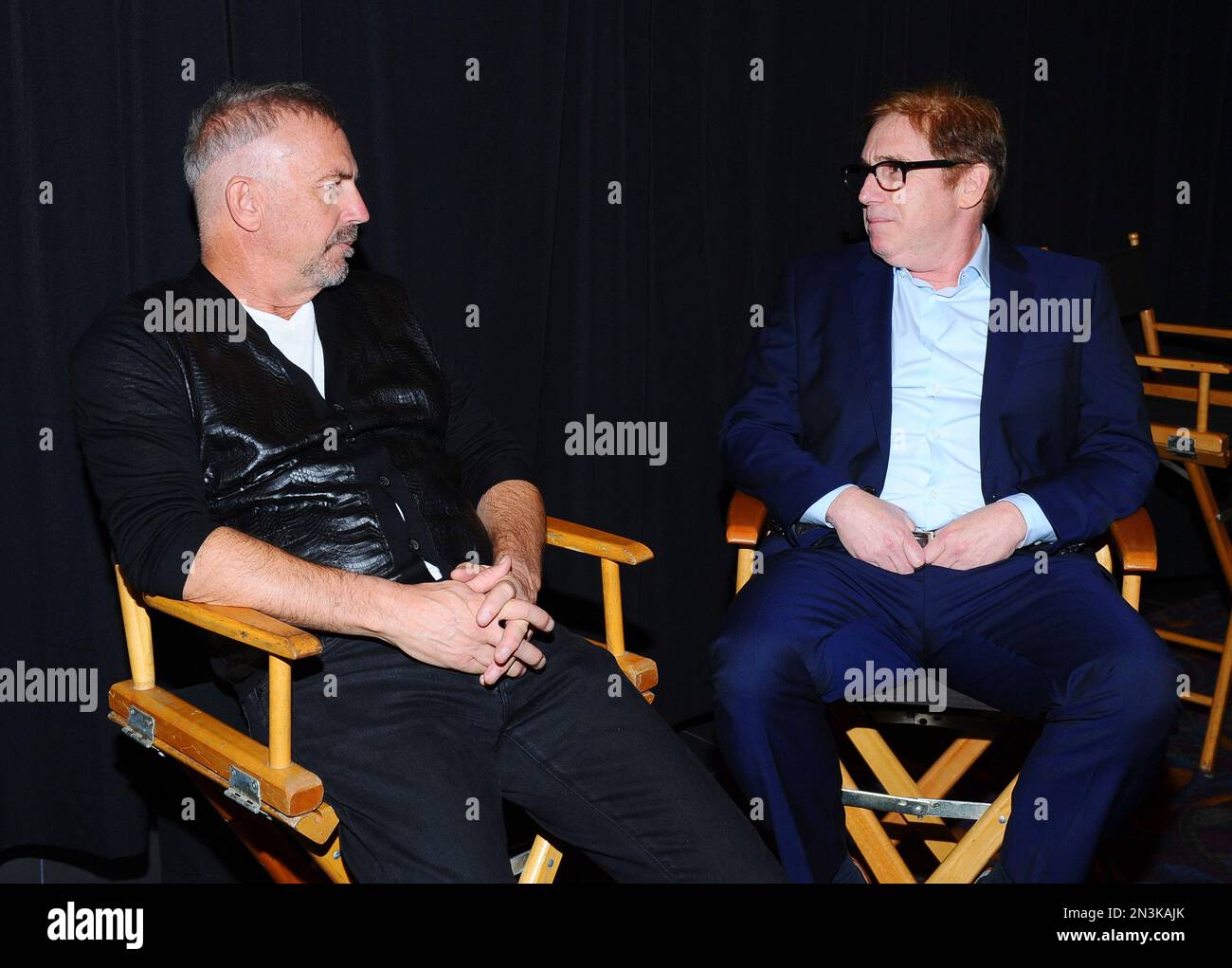 Kevin Costner, left, and director Mike Binder attend the AARP Movies ...