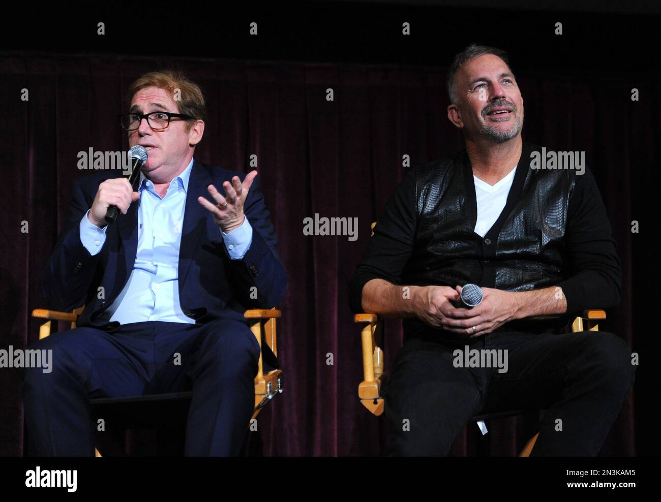 Director Mike Binder, left, and Kevin Costner attend the AARP Movies ...