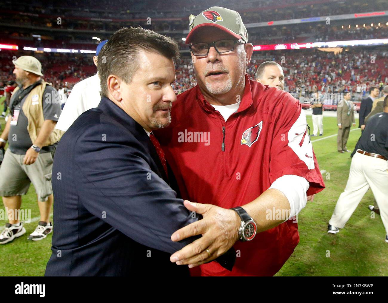 Arizona Cardinals head coach Bruce Arians, right, greets Cardinals ...