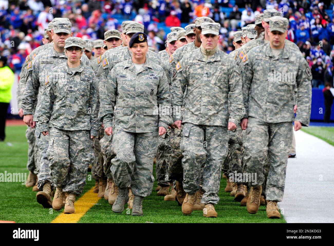 New York National Guard members march during halftime of an NFL ...