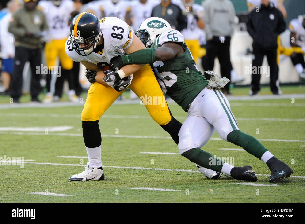New York Jets' Demario Davis (56) tackles Pittsburgh Steelers' Heath ...