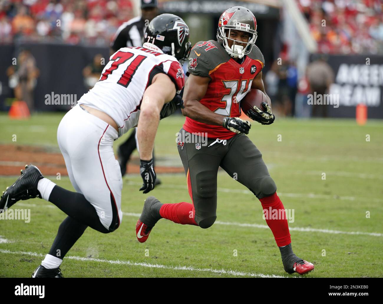 Tampa Bay Buccaneers running back Charles Sims (34) tries to cut around ...