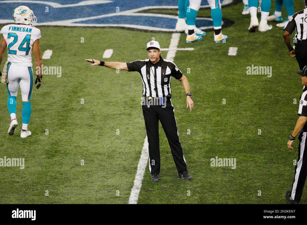 Referee Bill Leavy signals during the first half of an NFL football ...