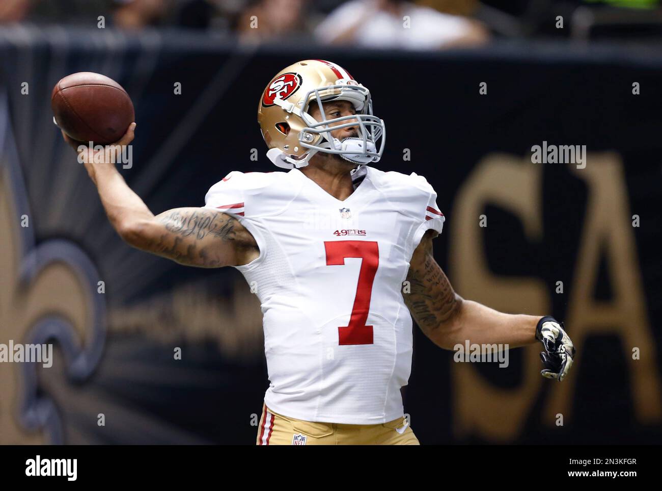San Francisco 49ers quarterback Colin Kaepernick (7) warms up before an ...