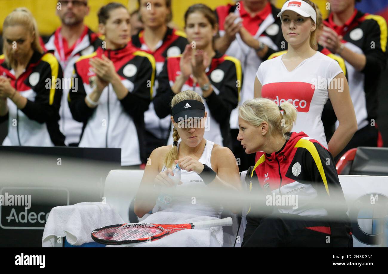 Germany's team captain Barbara Rittner, right, talks to Angelique ...