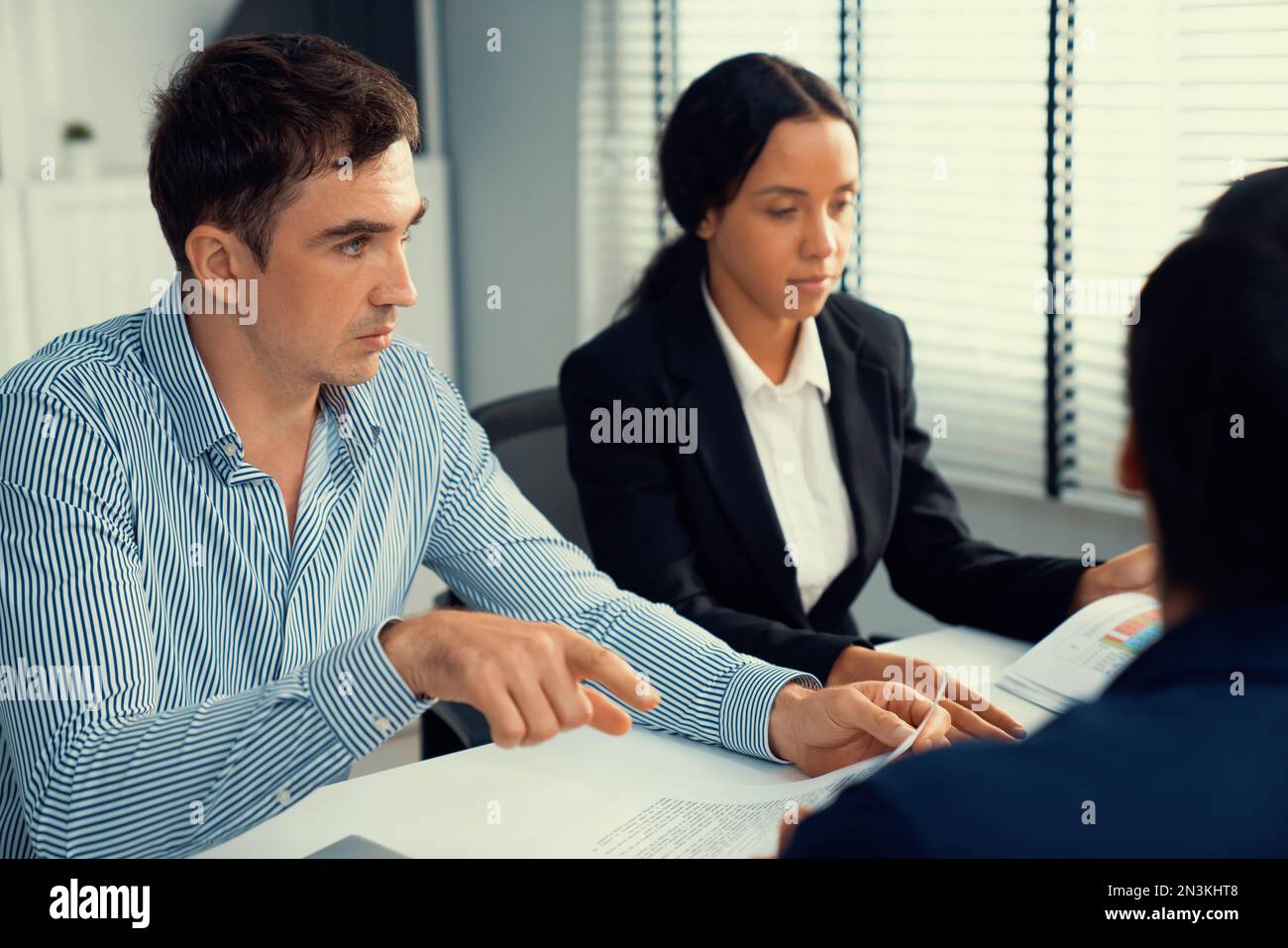 Colleagues debating office hi-res stock photography and images - Alamy