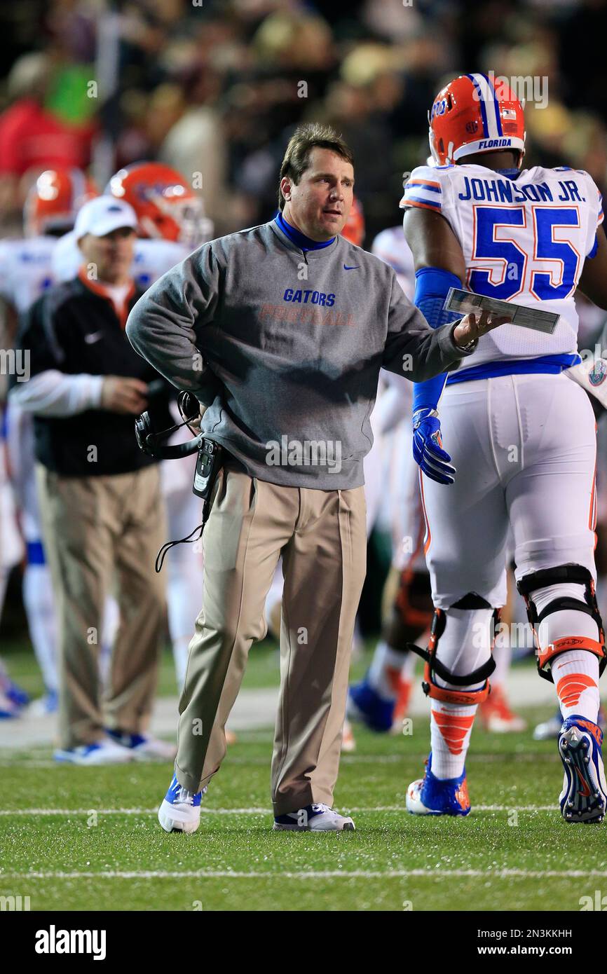 Florida head coach Will Muschamp talks to his players in the first ...