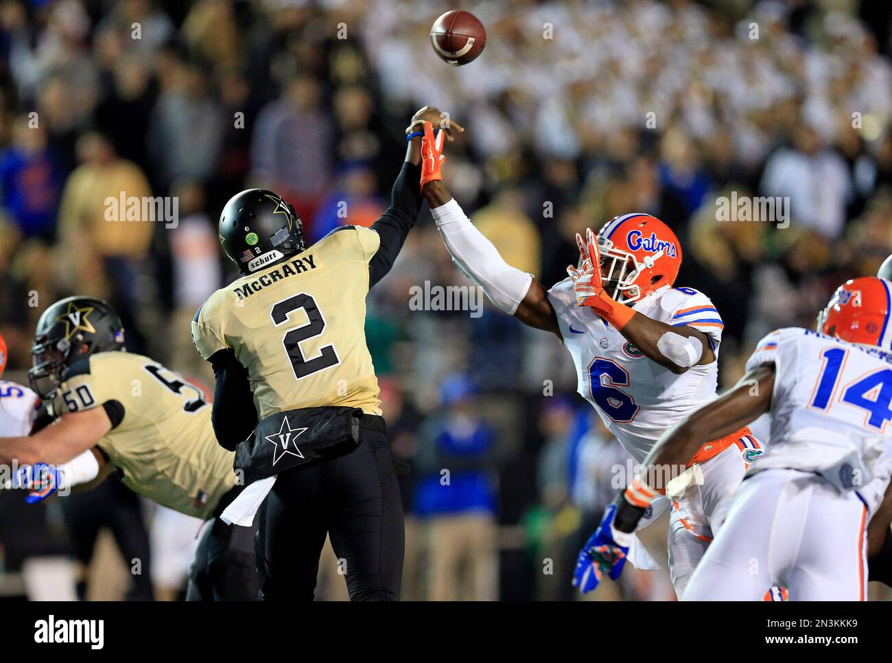 Vanderbilt quarterback Johnny McCrary (2) passes while pressured by ...