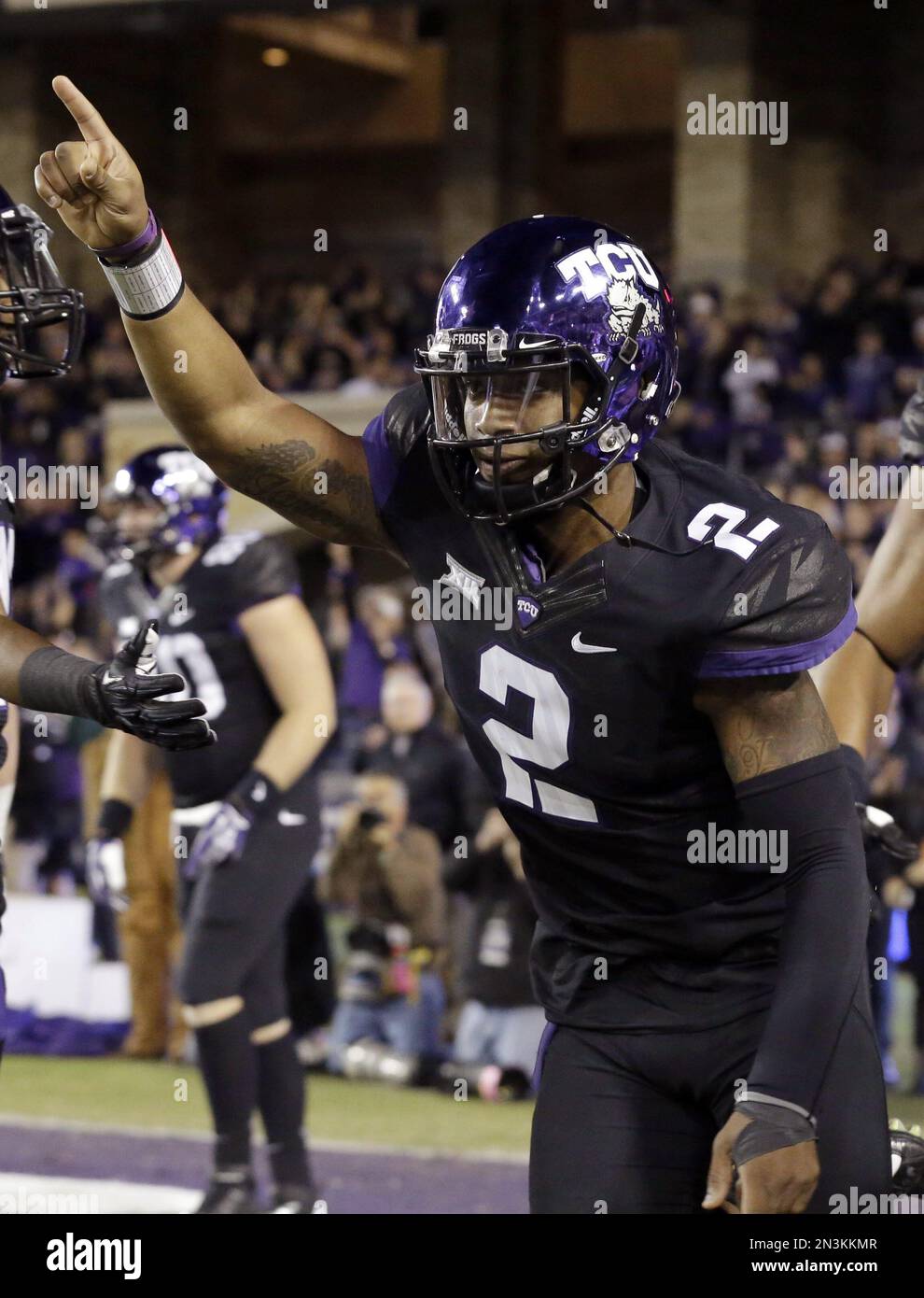 TCU quarterback Trevone Boykin (2) celebrates after rushing for a ...
