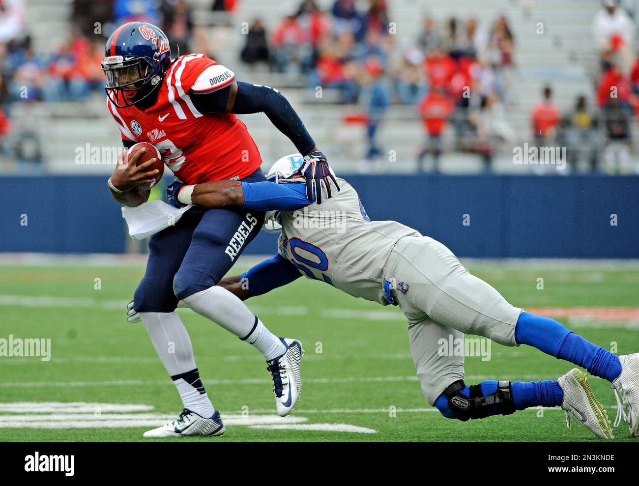 Presbyterian defensive back Cory White (20) tackles Mississippi ...
