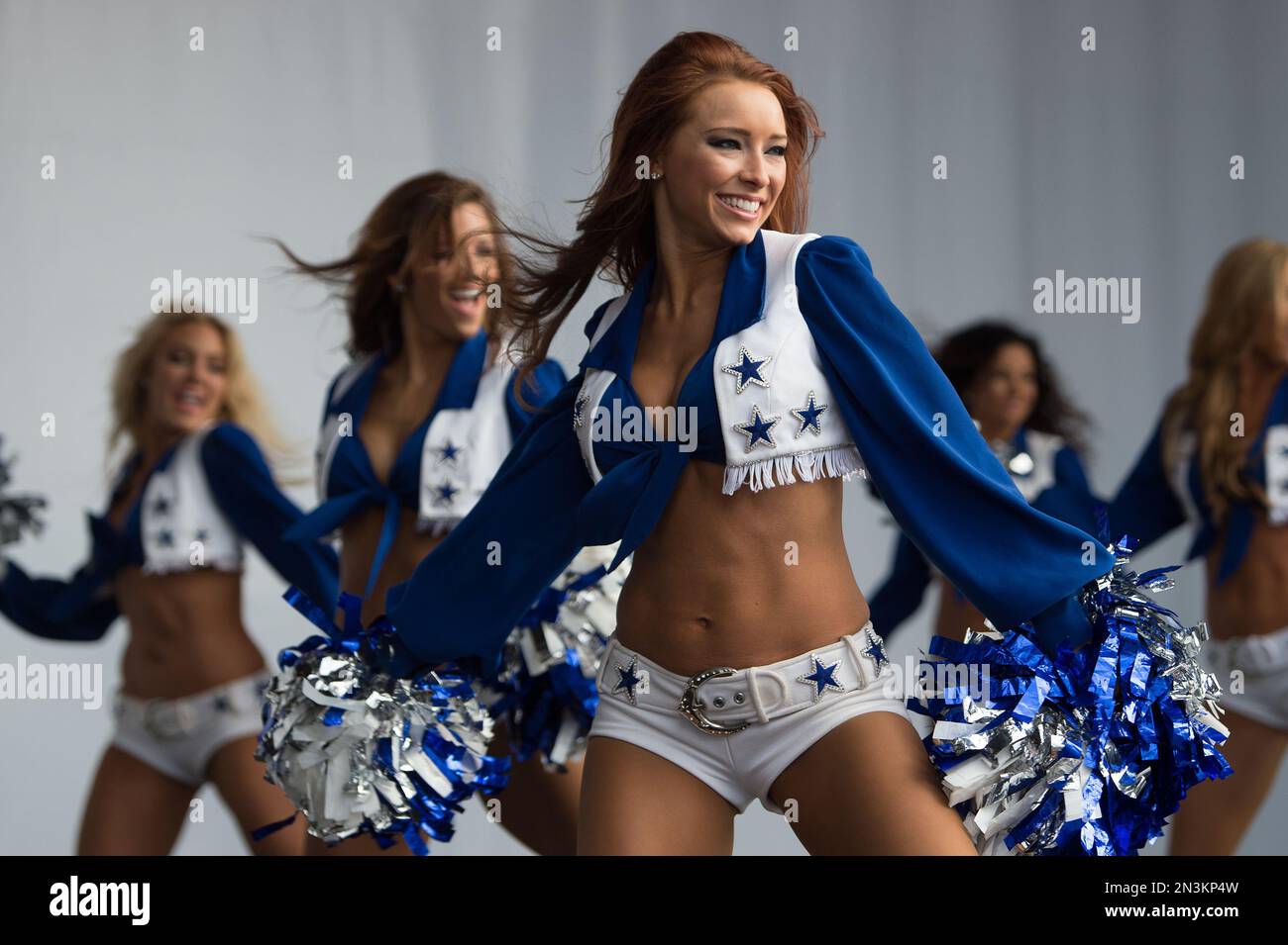 The Dallas Cowboys cheerleaders perform during the NFL Fan Rally outside Wembley Stadium, London ...