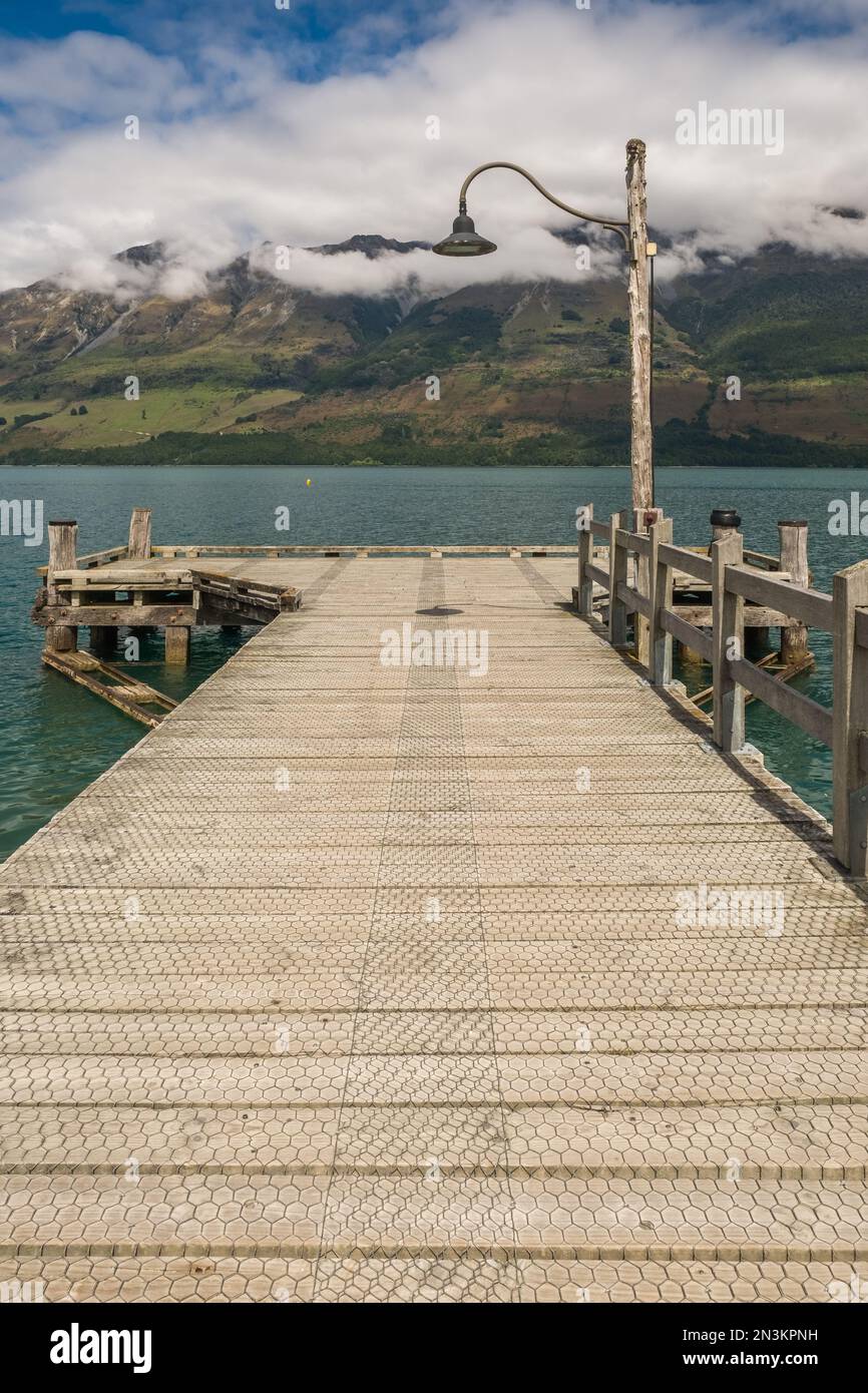 The wooden jetty at Glenorchy on Lake Wakatipu in New Zealand used for ...