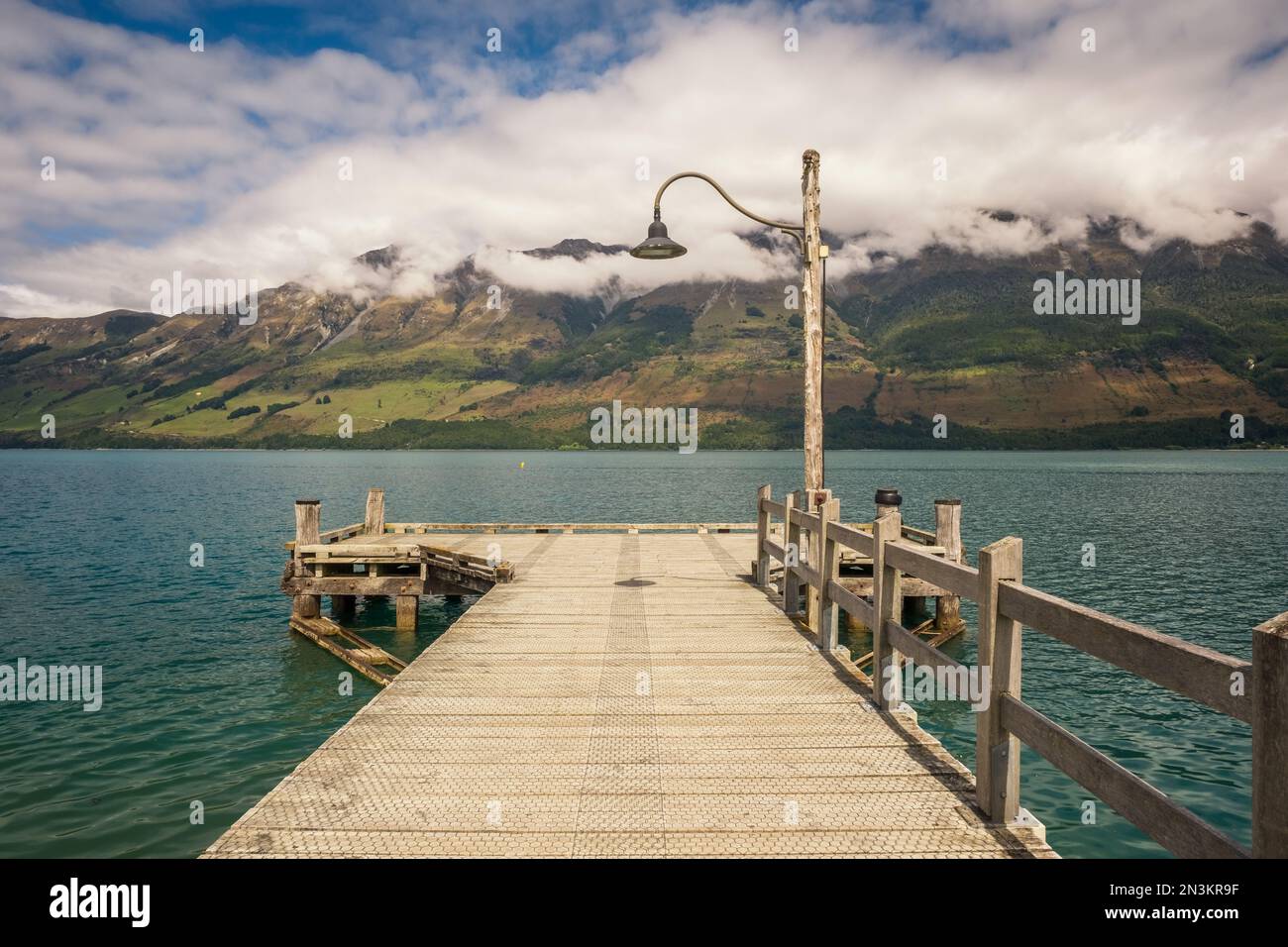 The wooden jetty at Glenorchy on Lake Wakatipu in New Zealand used for ...