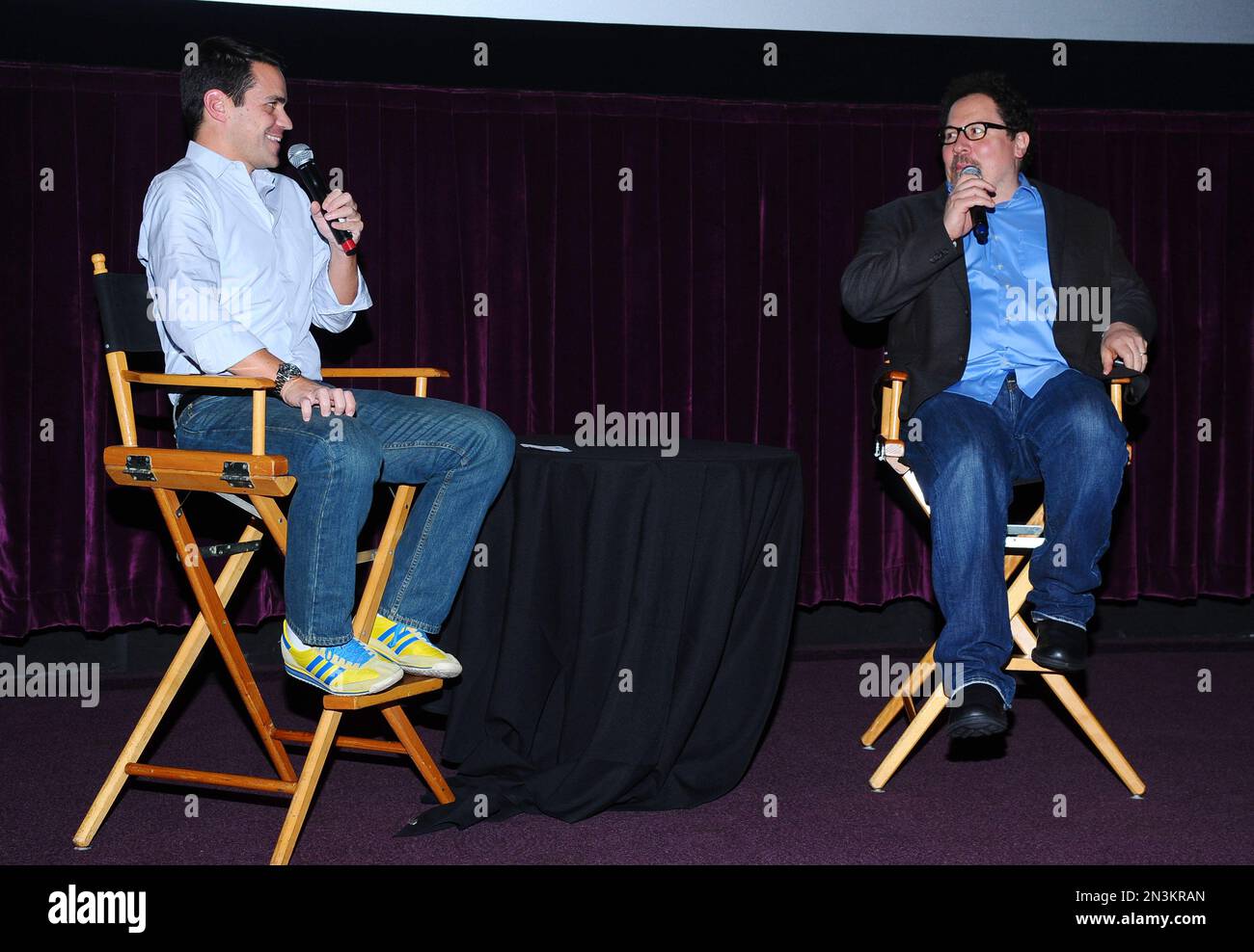 Fandango's Dave Karger, left, and Jon Favreau attend the AARP Movies ...