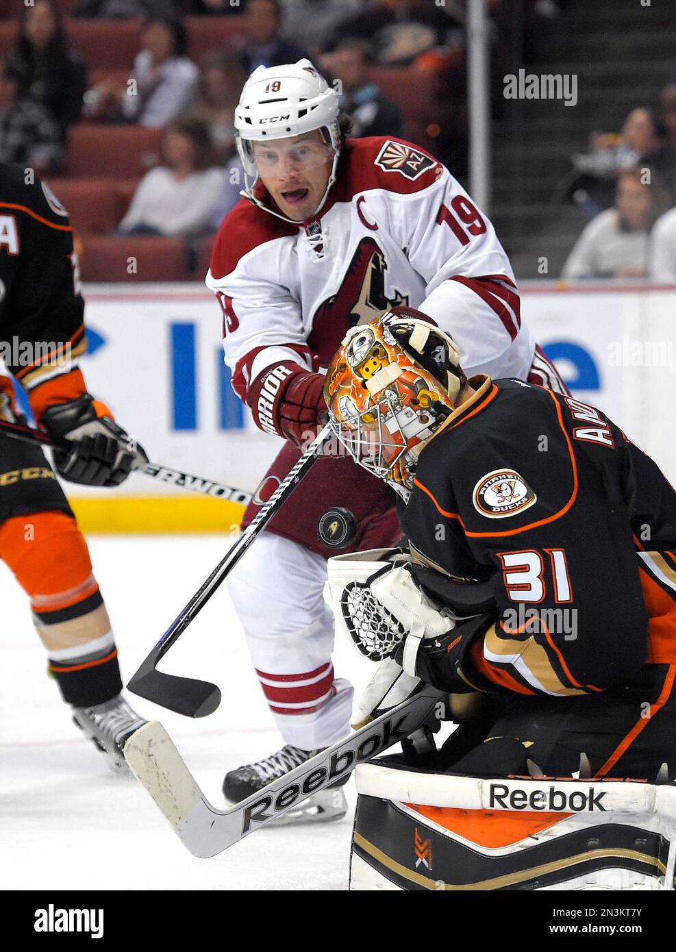 Arizona Coyotes right wing Shane Doan, left, tries to get a shot in ...