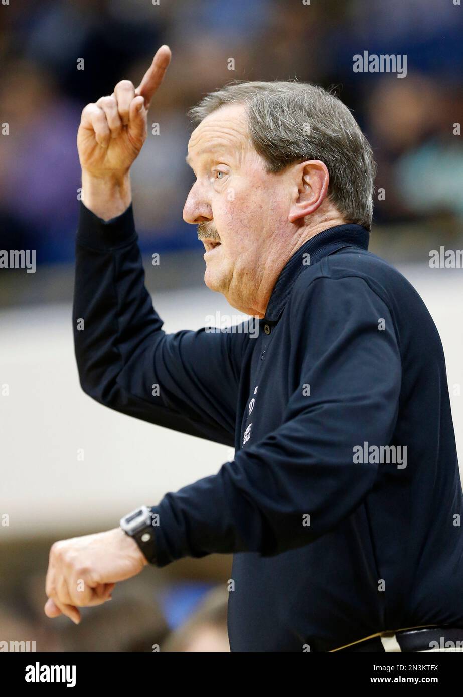 Philadelphia head coach Herb Magee signals to his team as they play in ...