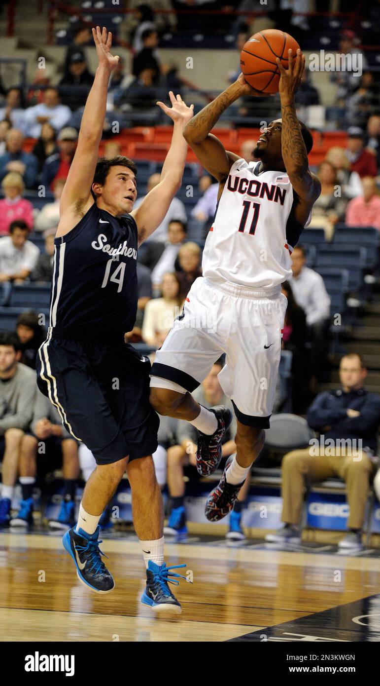 In this Tuesday, Nov. 4, 2014 photo, Connecticut's Ryan Boatright (11 ...