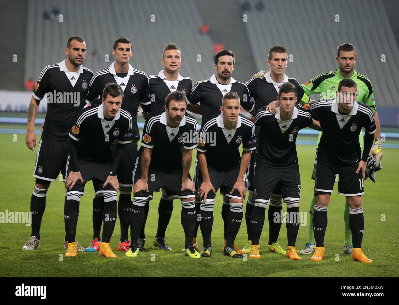 Soccer players of Partizan pose for a team photo before their Europa ...