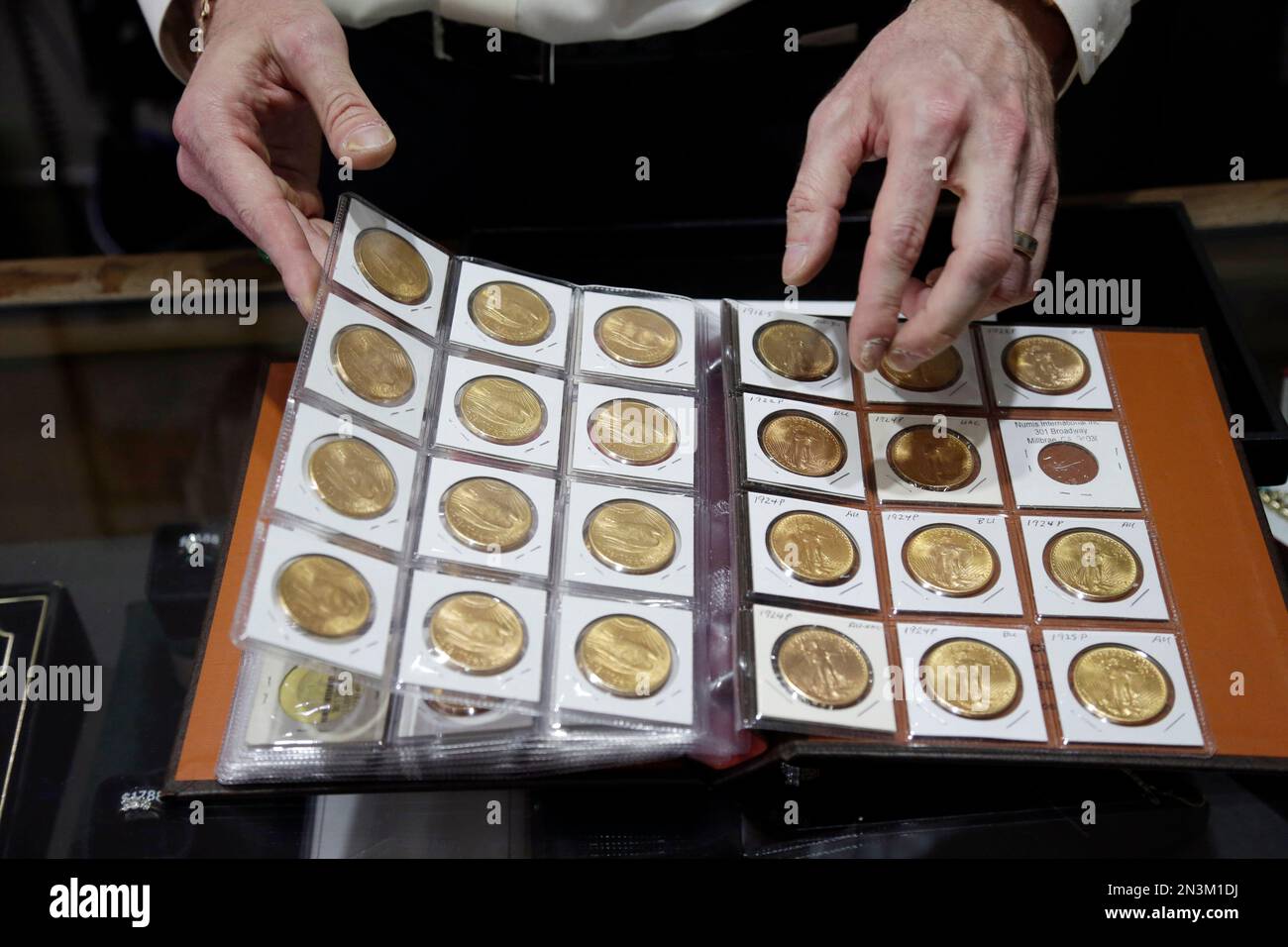 In this Wednesday, Nov. 5, 2014 photo, Numis International Inc. owner ...