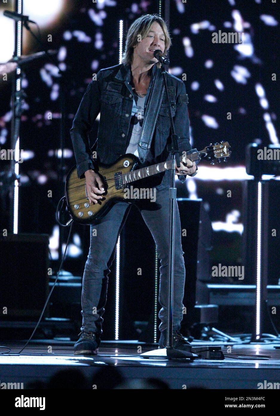 Keith Urban performs on stage at the 48th annual CMA Awards at the ...