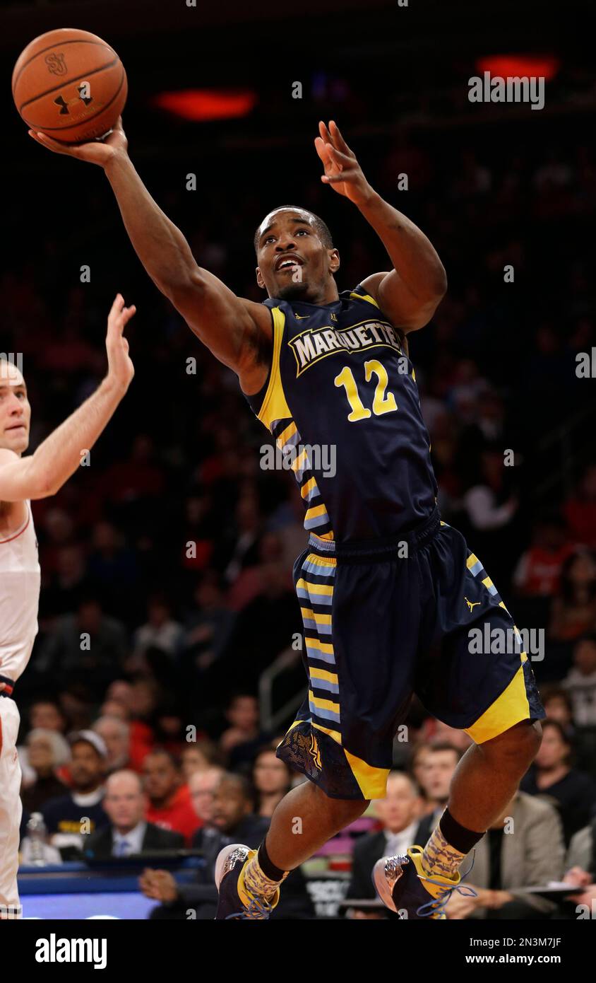 FILE - In this Feb. 1, 2014, file photo, Marquette's Derrick Wilson ...
