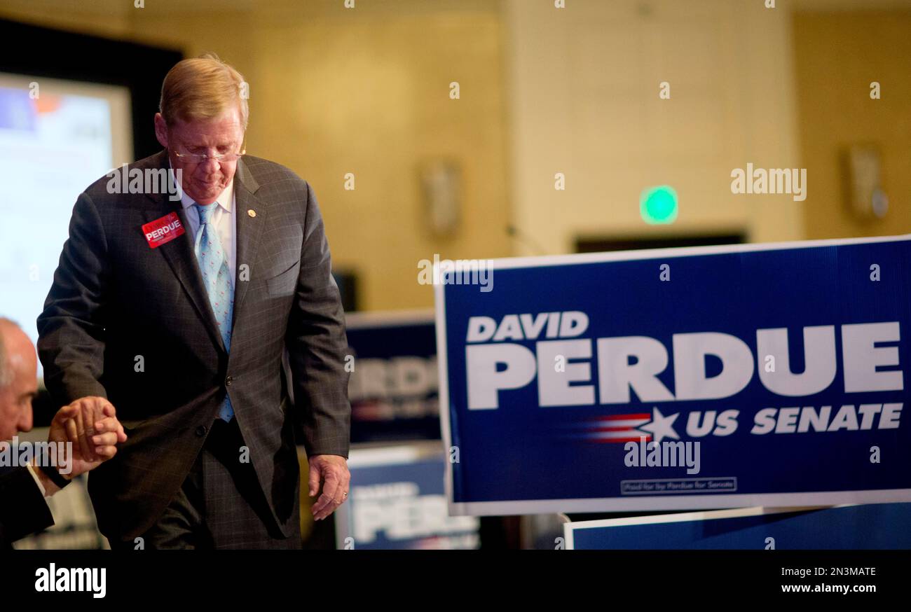 U.S. Sen. Johnny Isakson, R-Ga., steps off the stage after speaking at ...
